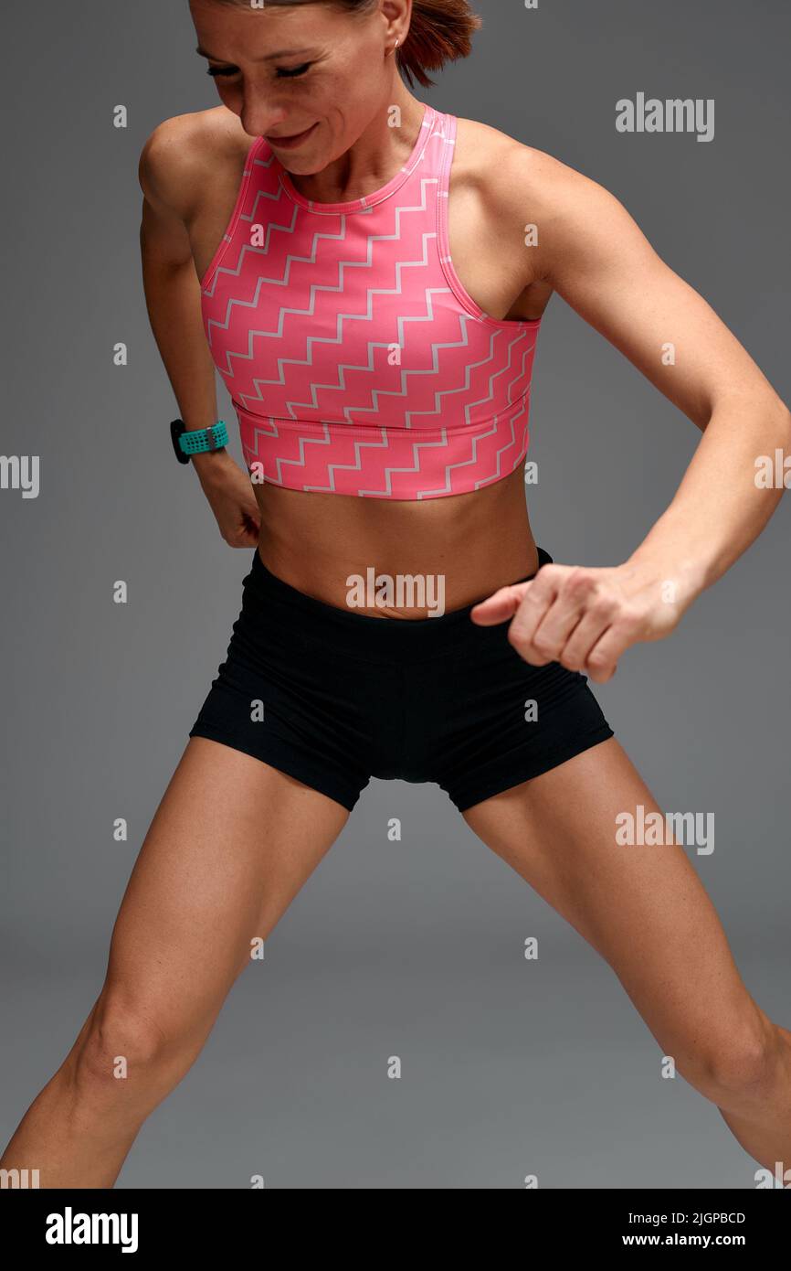 Fitness woman jumping and running, working out. Athletic girl doing ...