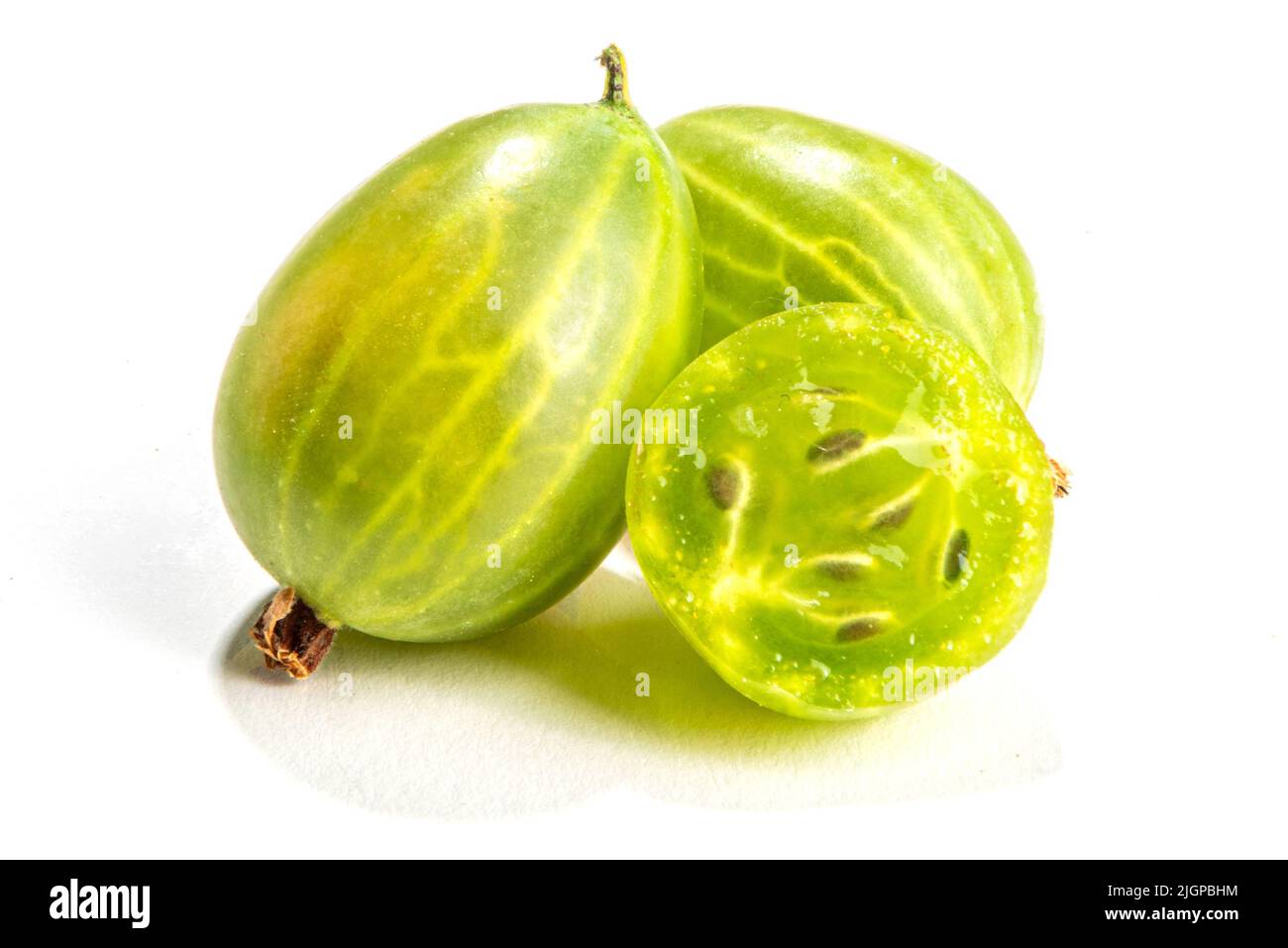 Fresh ripe raw green gooseberry, group of whole and half gooseberries ...