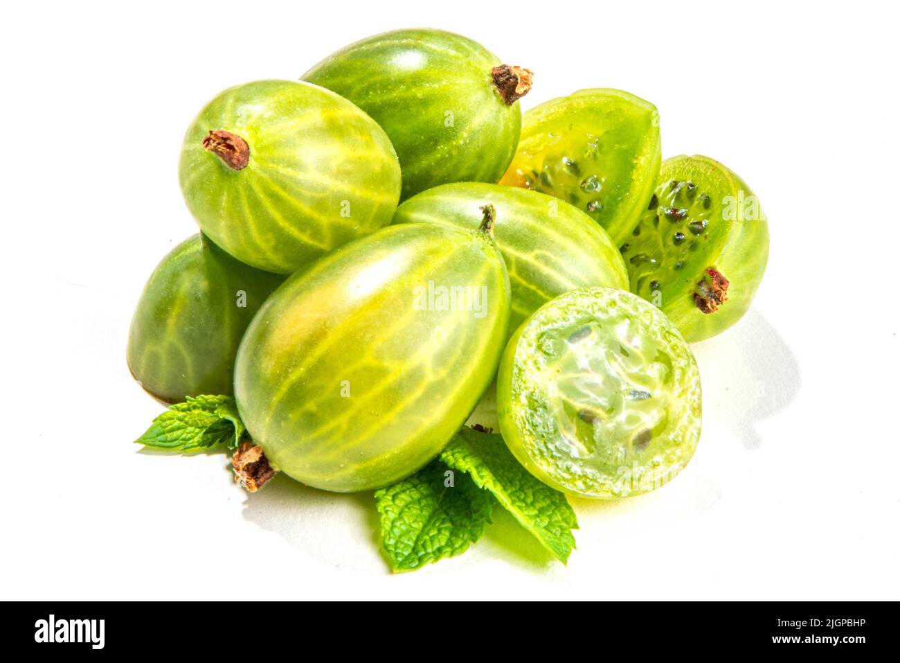 Fresh ripe raw green gooseberry, group of whole and half gooseberries ...