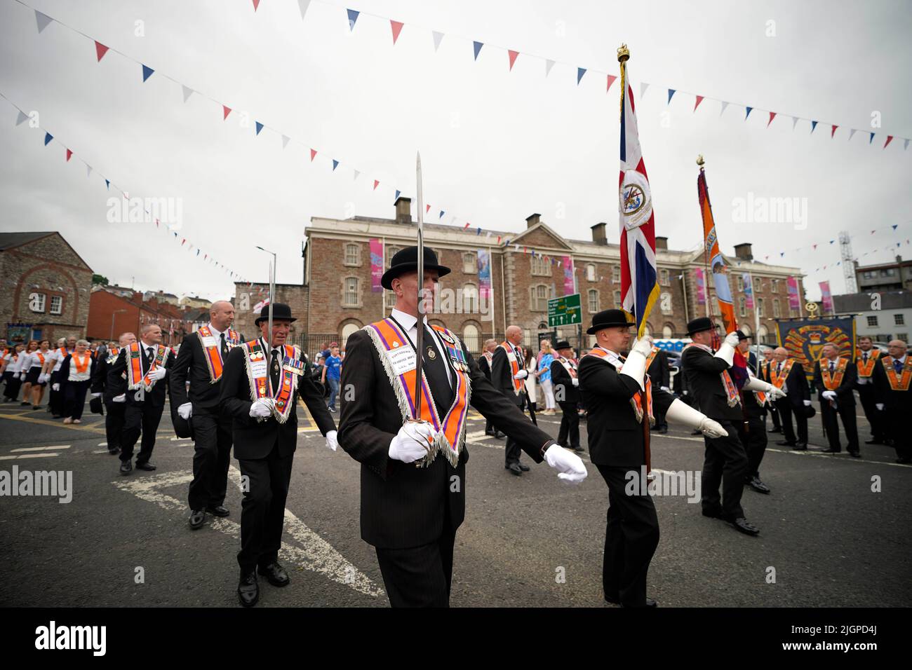 Members of the Orange Order take part in a Twelfth of July parade in ...
