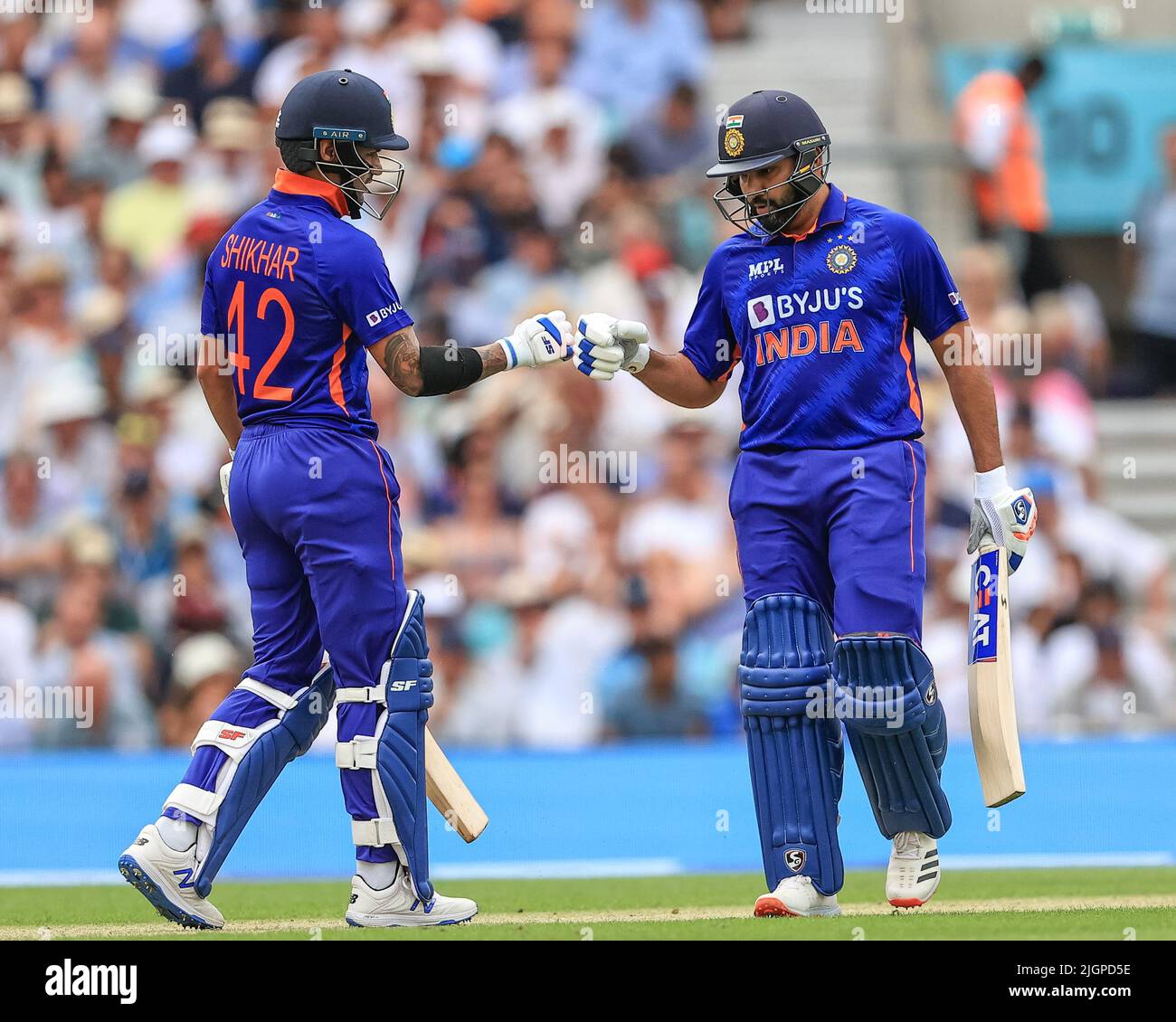 Shreyas Iyer of India congratulates Rohit Sharma of India after he hits ...