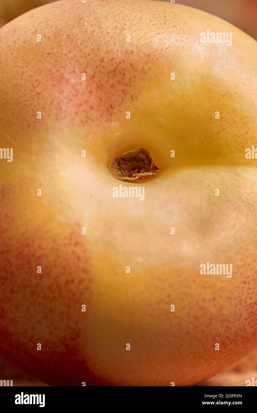 Ripe nectarine close-up. Selective focus, vertical format Stock Photo ...
