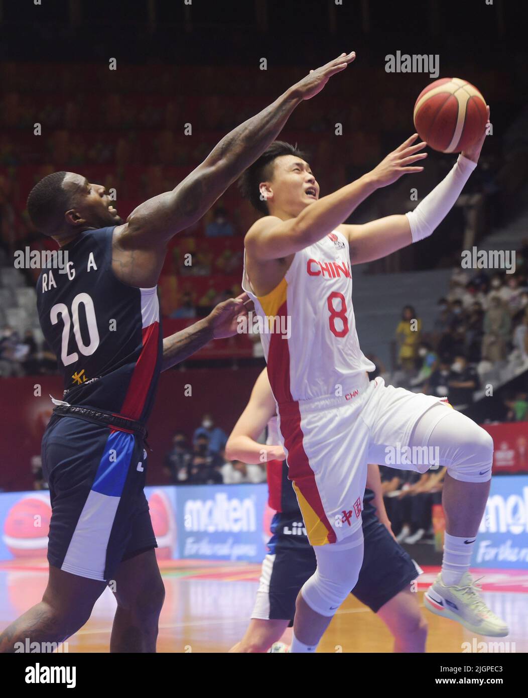 Jakarta, Indonesia. 12th July, 2022. Zhao Rui (R) of China goes up for ...