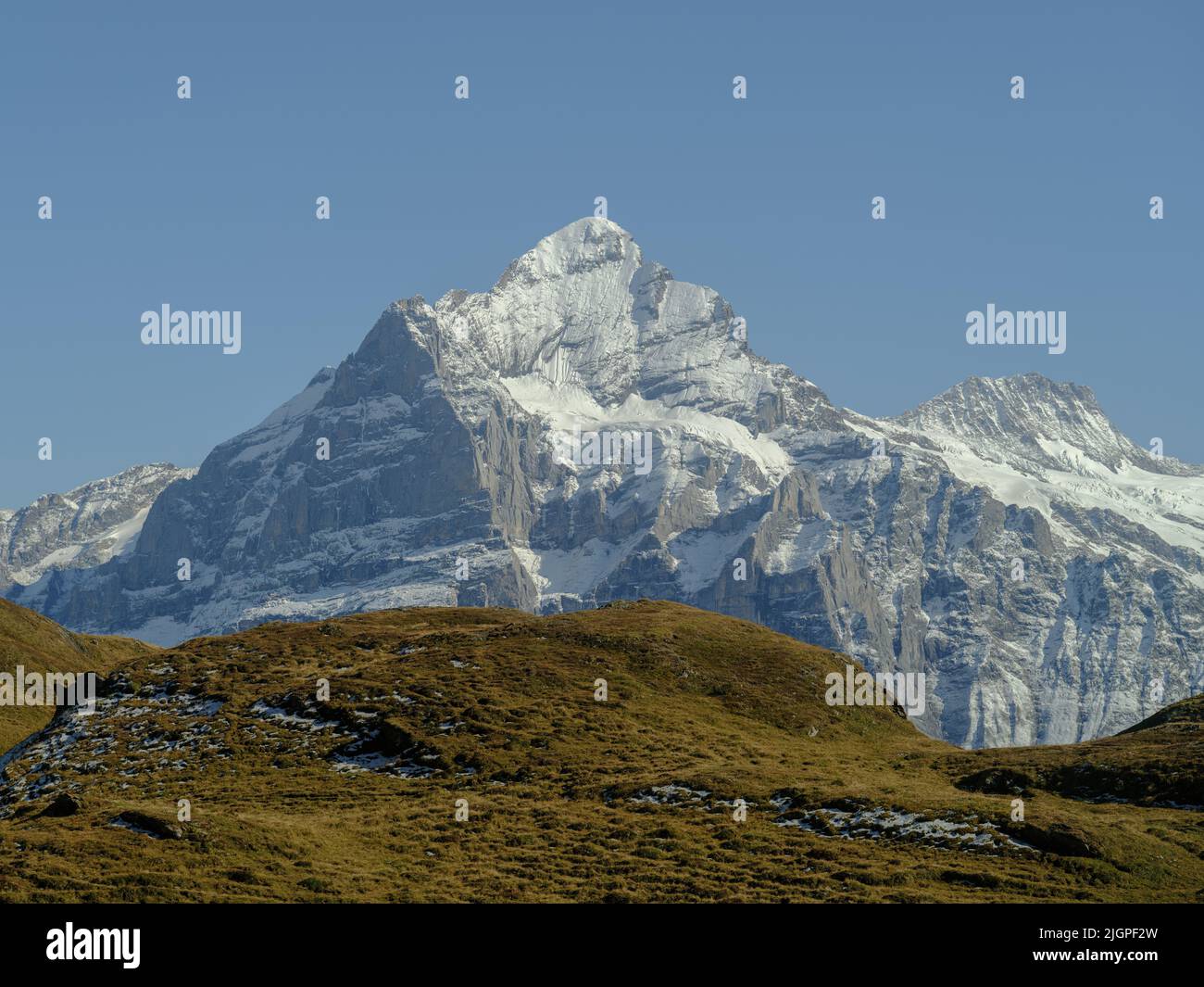 Rocky mountains and reflection on the surface of the lake. Landscape in ...
