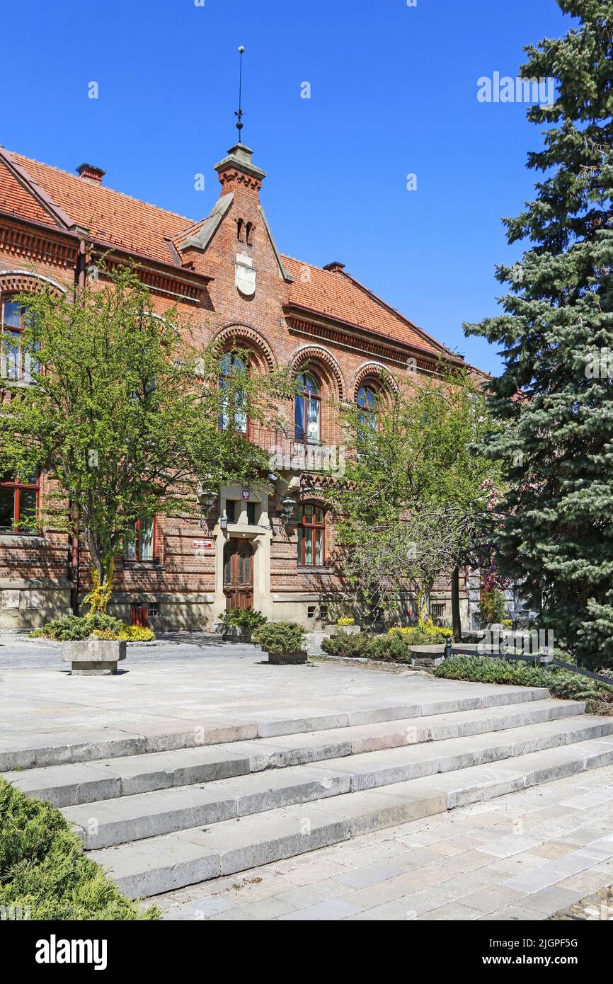 The old architecture by the main market square in Myslenice, Poland ...