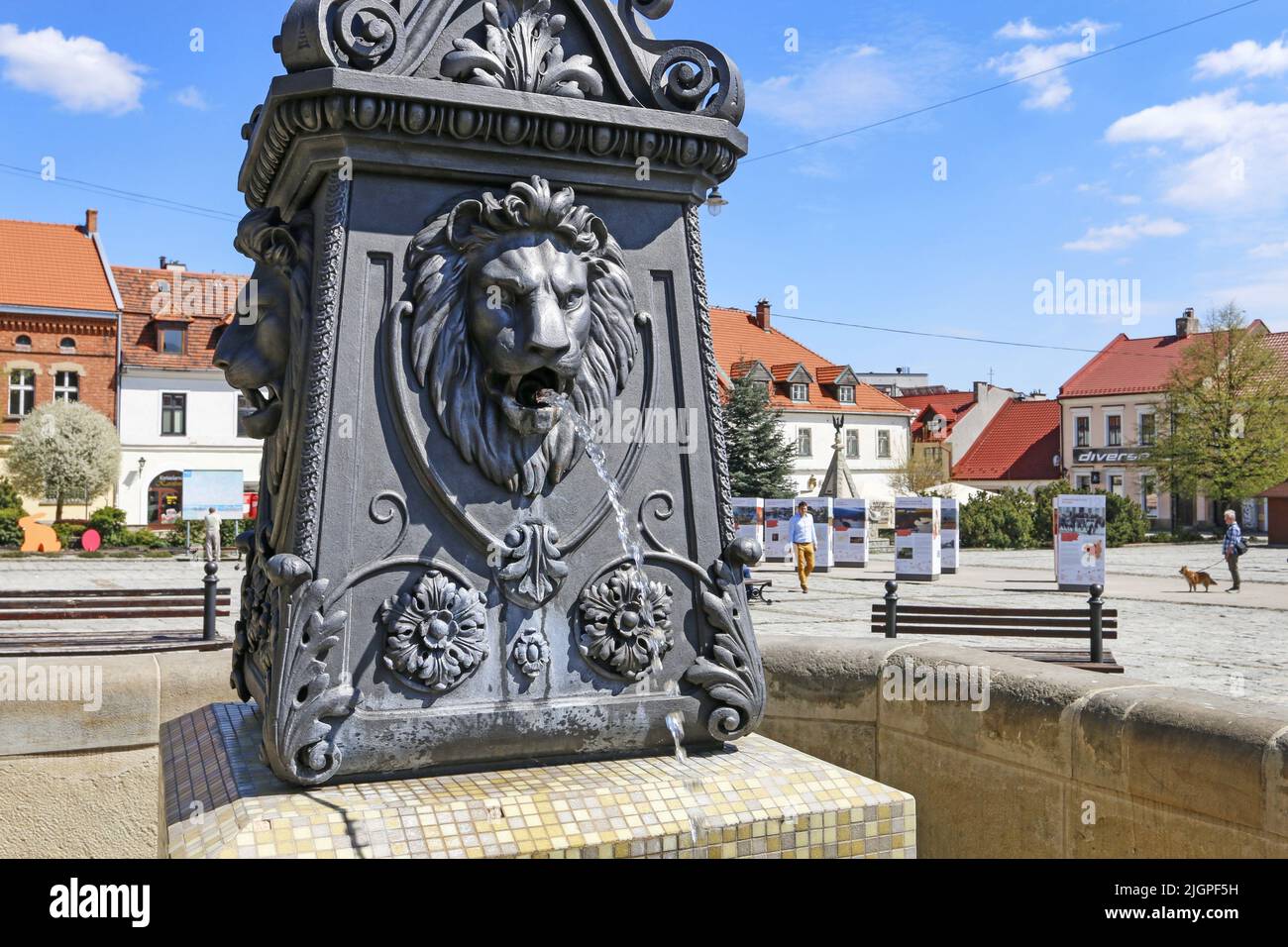 The fountain on the main market square in Myslenice, Poland Stock Photo ...