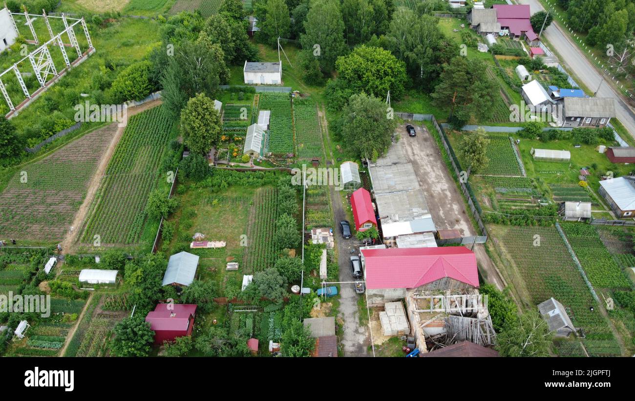 Summer photo of a green village from quadrocopter Stock Photo - Alamy