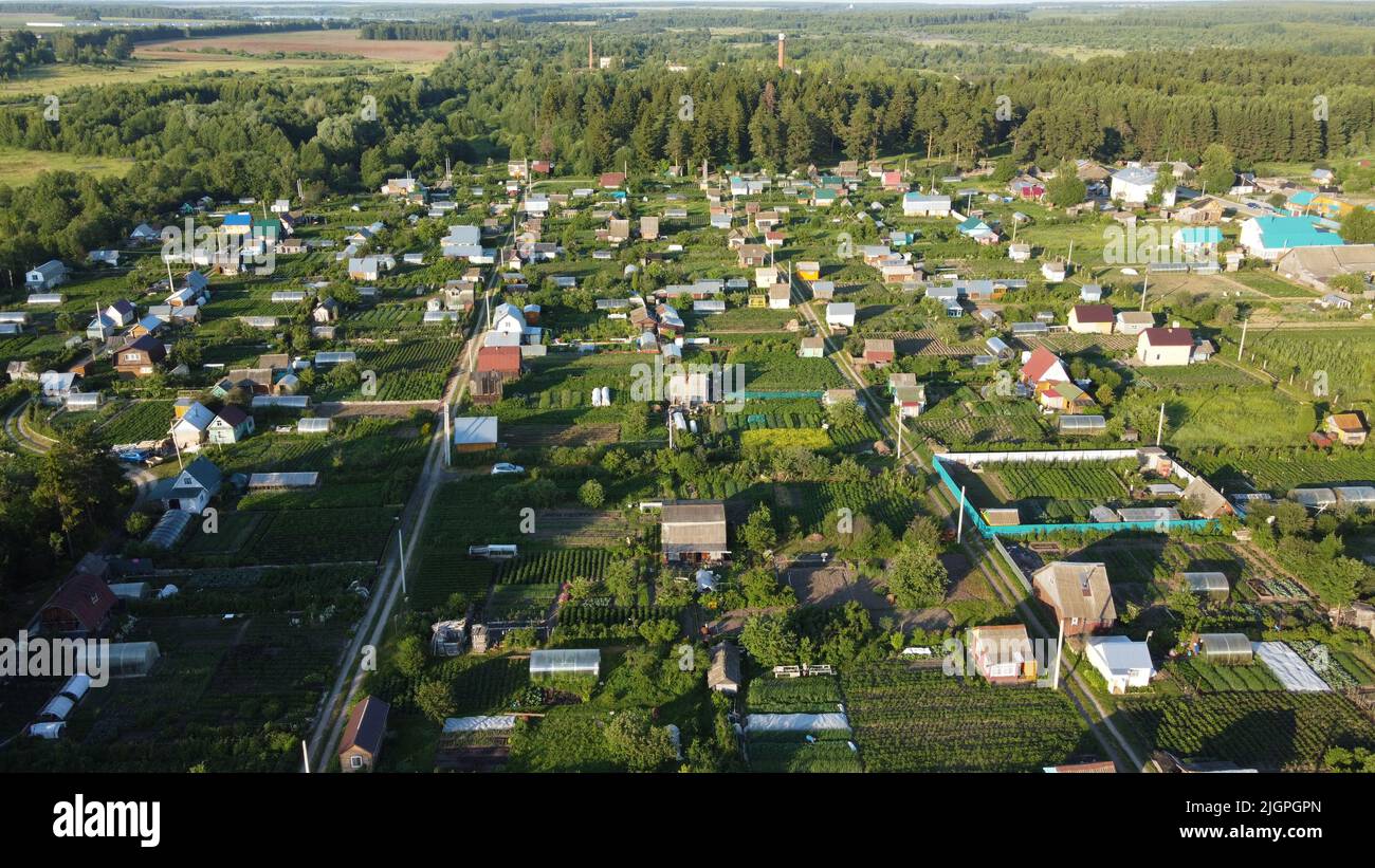 Summer photo of a green village from quadrocopter Stock Photo - Alamy