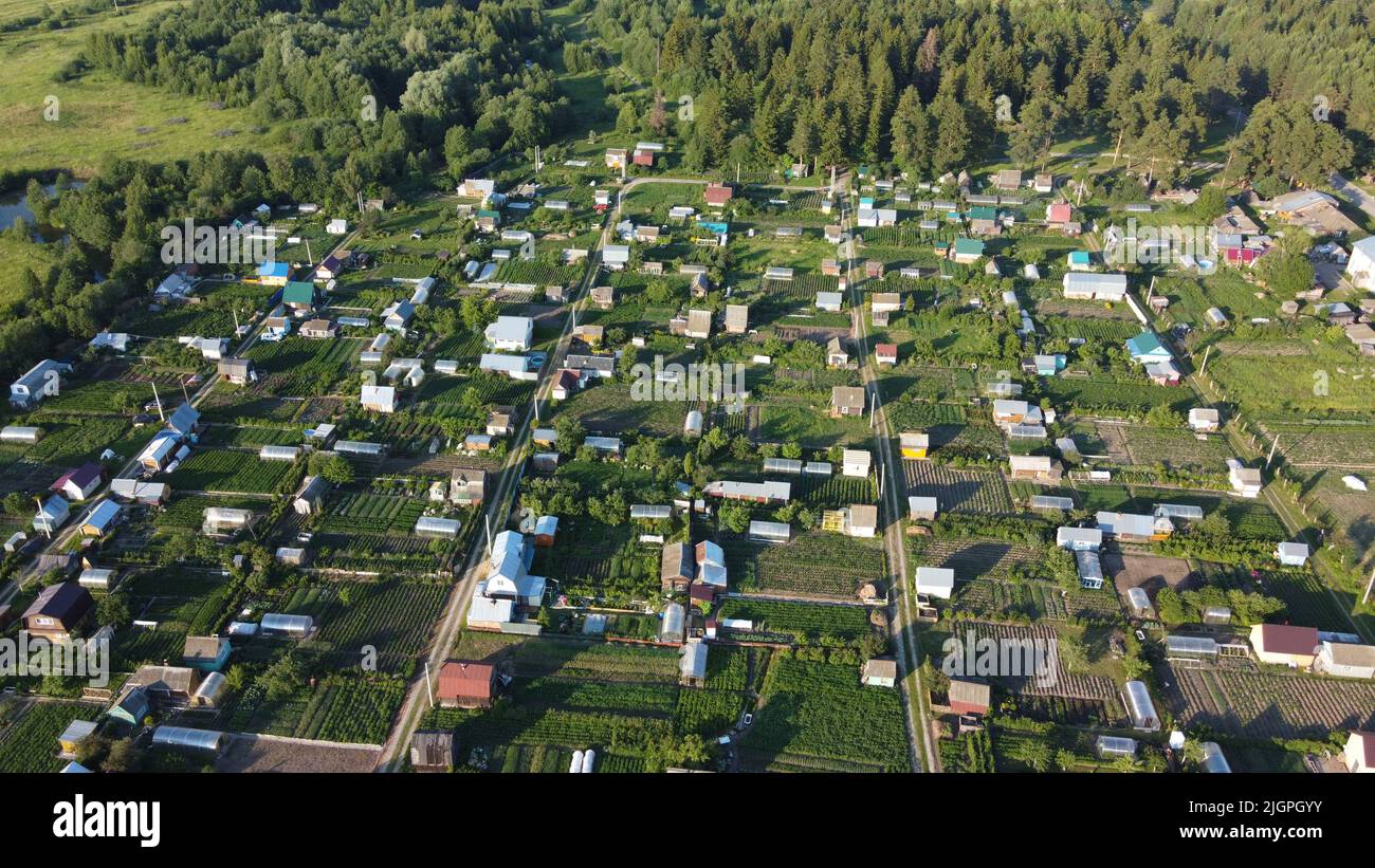 Summer photo of a green village from quadrocopter Stock Photo - Alamy