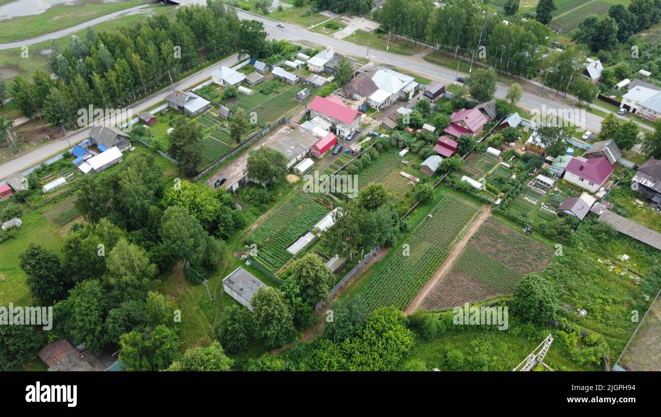 Summer photo of a green village from quadrocopter Stock Photo - Alamy