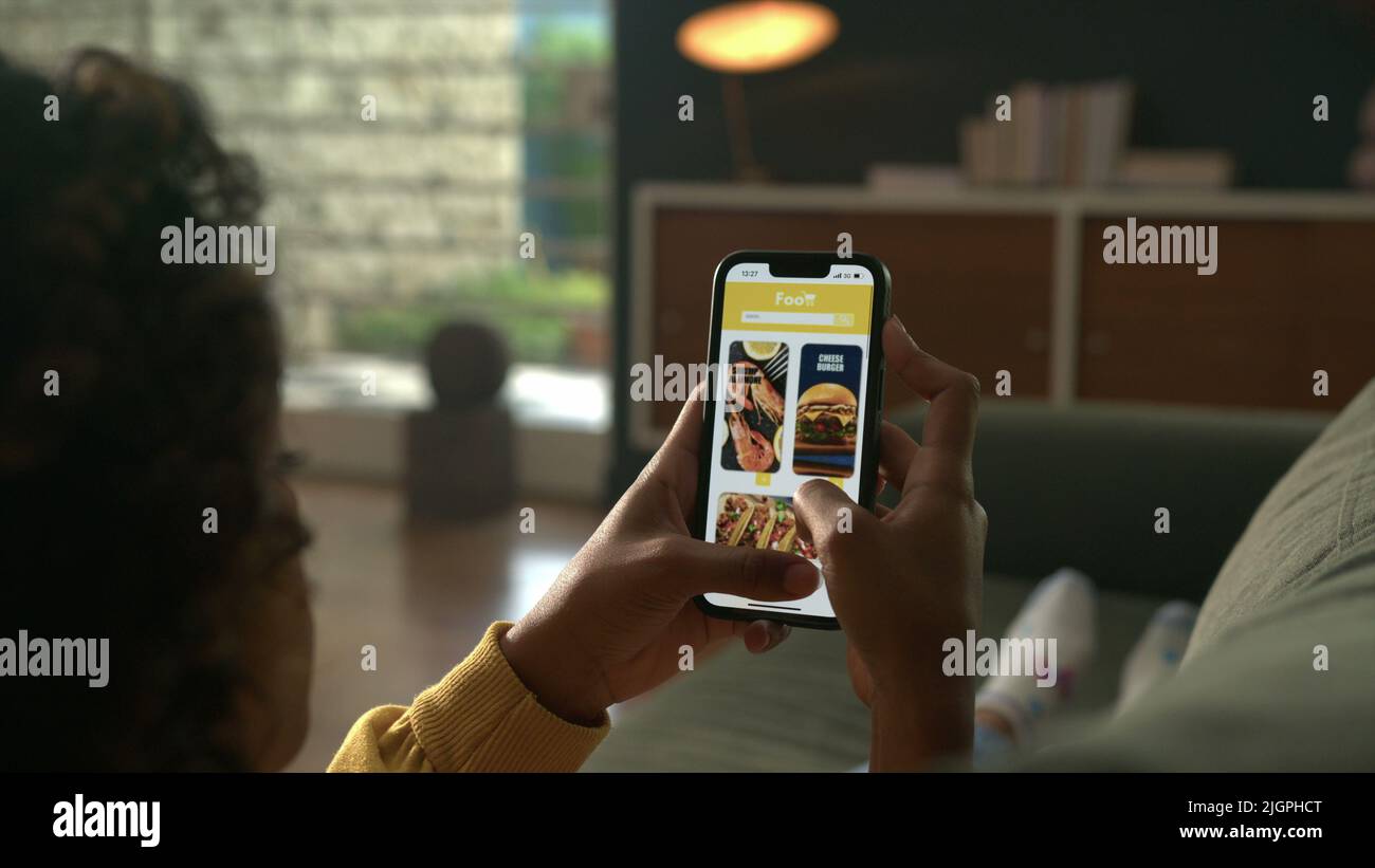 Person Using Online Delivery menu phone. Woman Orders at Food Home In ...