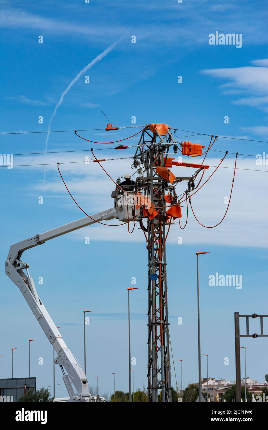 Electrician operating hydraulic platform hi-res stock photography and ...