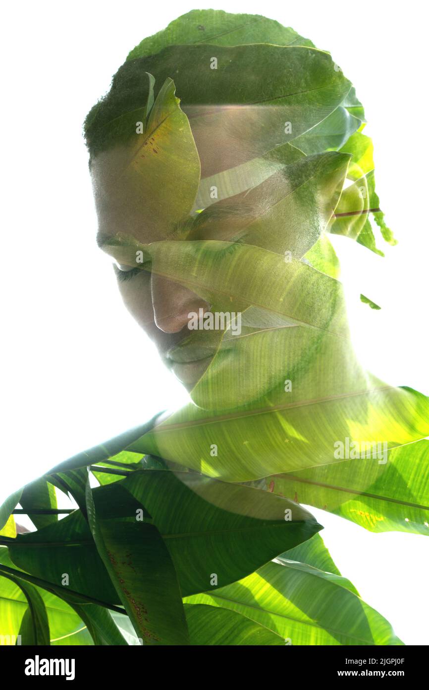 Portrait of a man and vibrant leaves combined in a double exposure ...