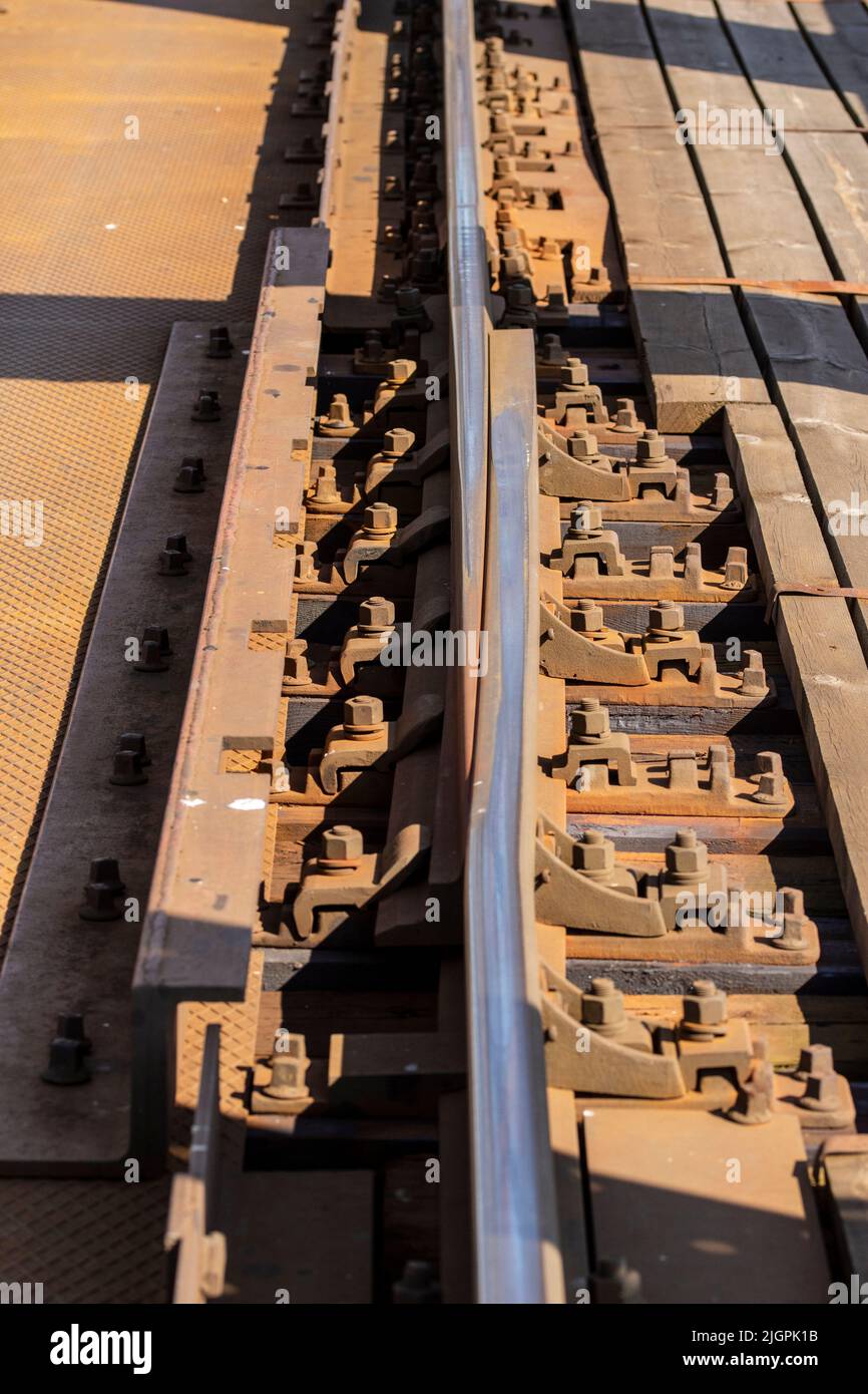 Connecting rails on the viaduct along the tracks Stock Photo - Alamy