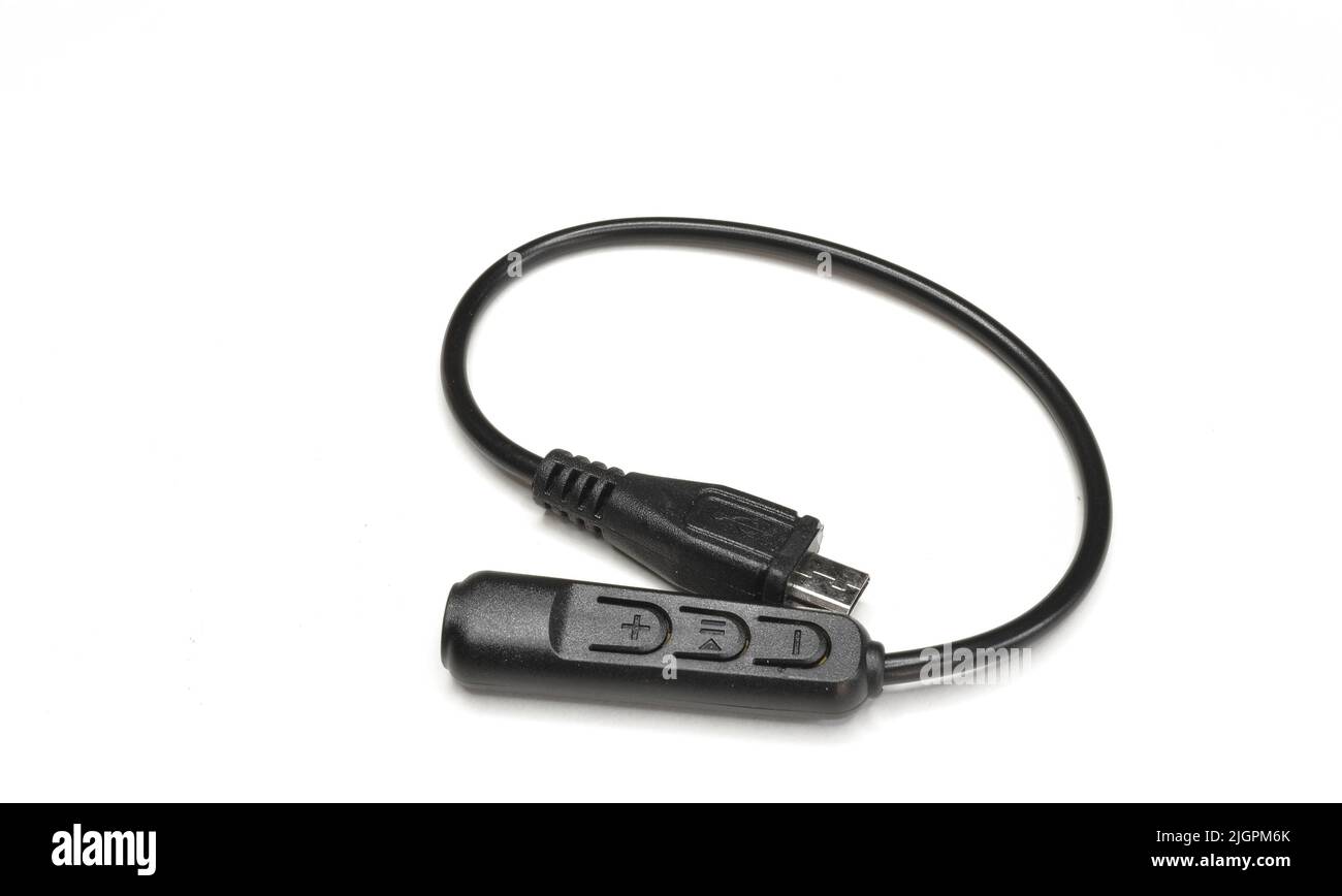Small cable with play button, and buttons for high and low volume on ...