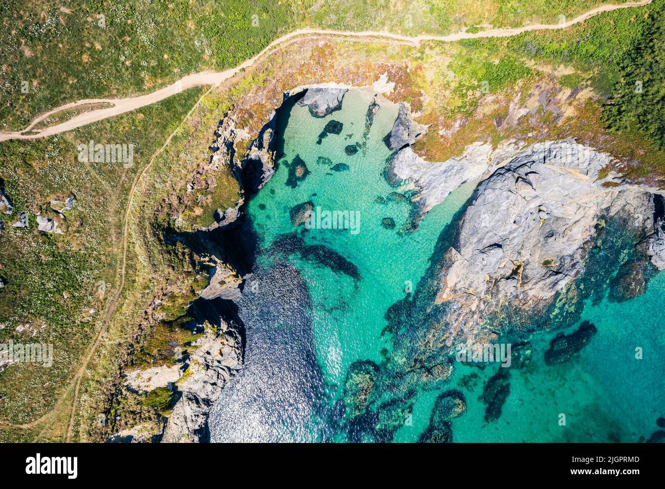 Top Down over Piskies Cove and HMS Warspite Cliffs from a drone ...