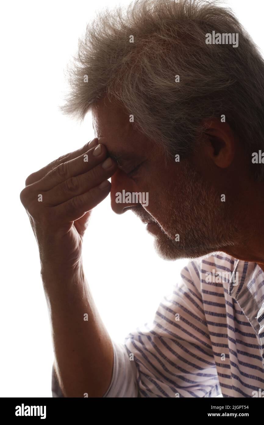 A depressed man in the shadow. Sadness and problems Stock Photo - Alamy