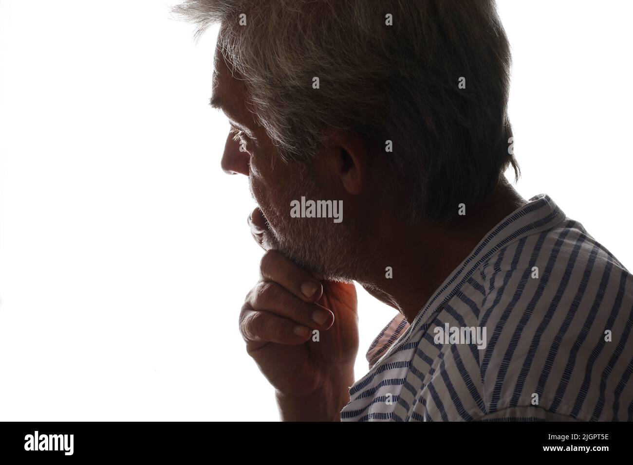 A depressed man in the shadow. Sadness and problems Stock Photo - Alamy