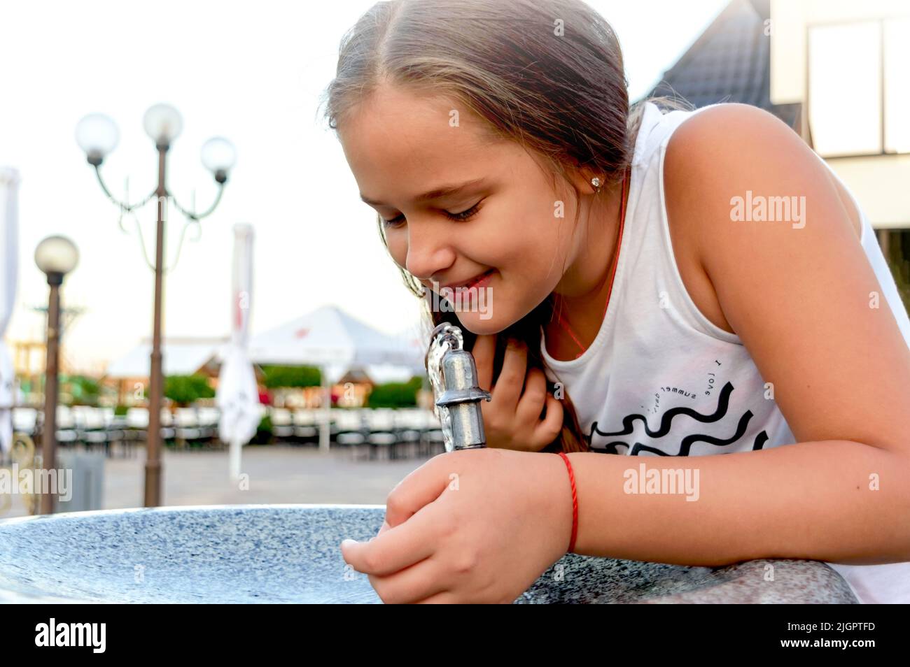 Cheerful wet teen girl hi-res stock photography and images - Alamy