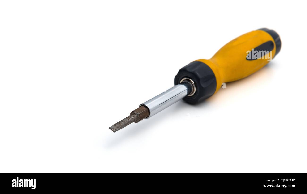 Yellow metallic manual multi-bit screwdriver with replaceable bits ...