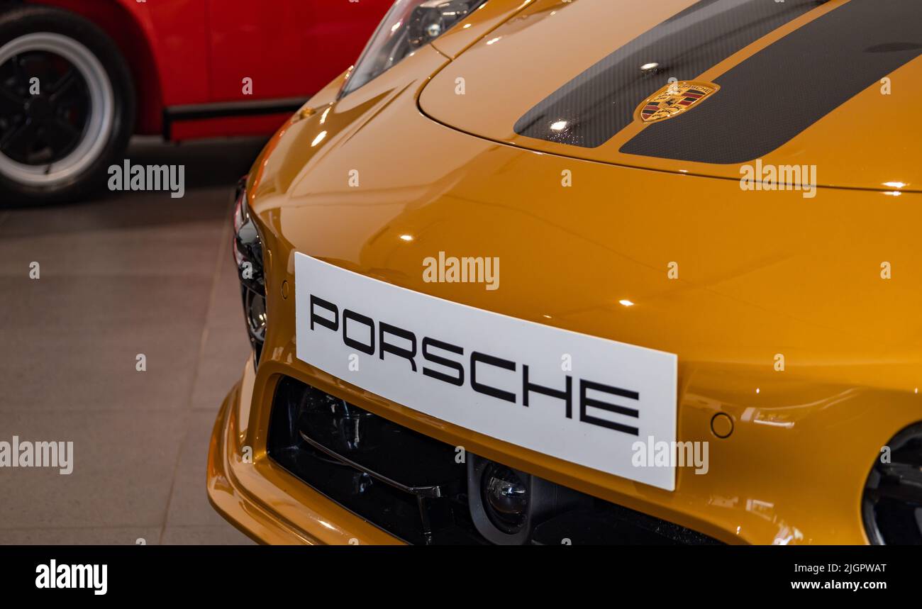 A close-up picture of the license plate of an orange Porsche 911 Turbo ...