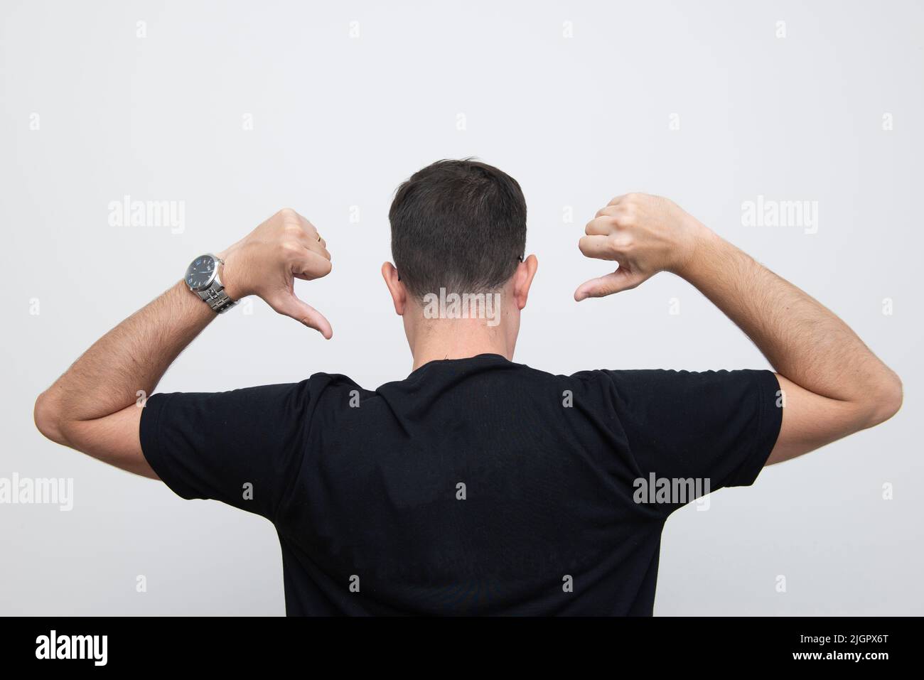Man with raised arms hi-res stock photography and images - Alamy