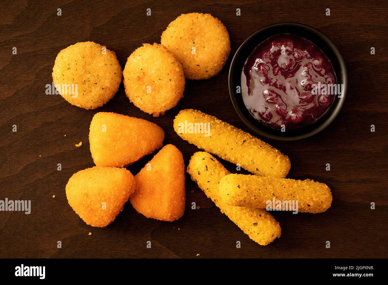 Fried breaded brie and camembert nuggets, mozzarella sticks and ...