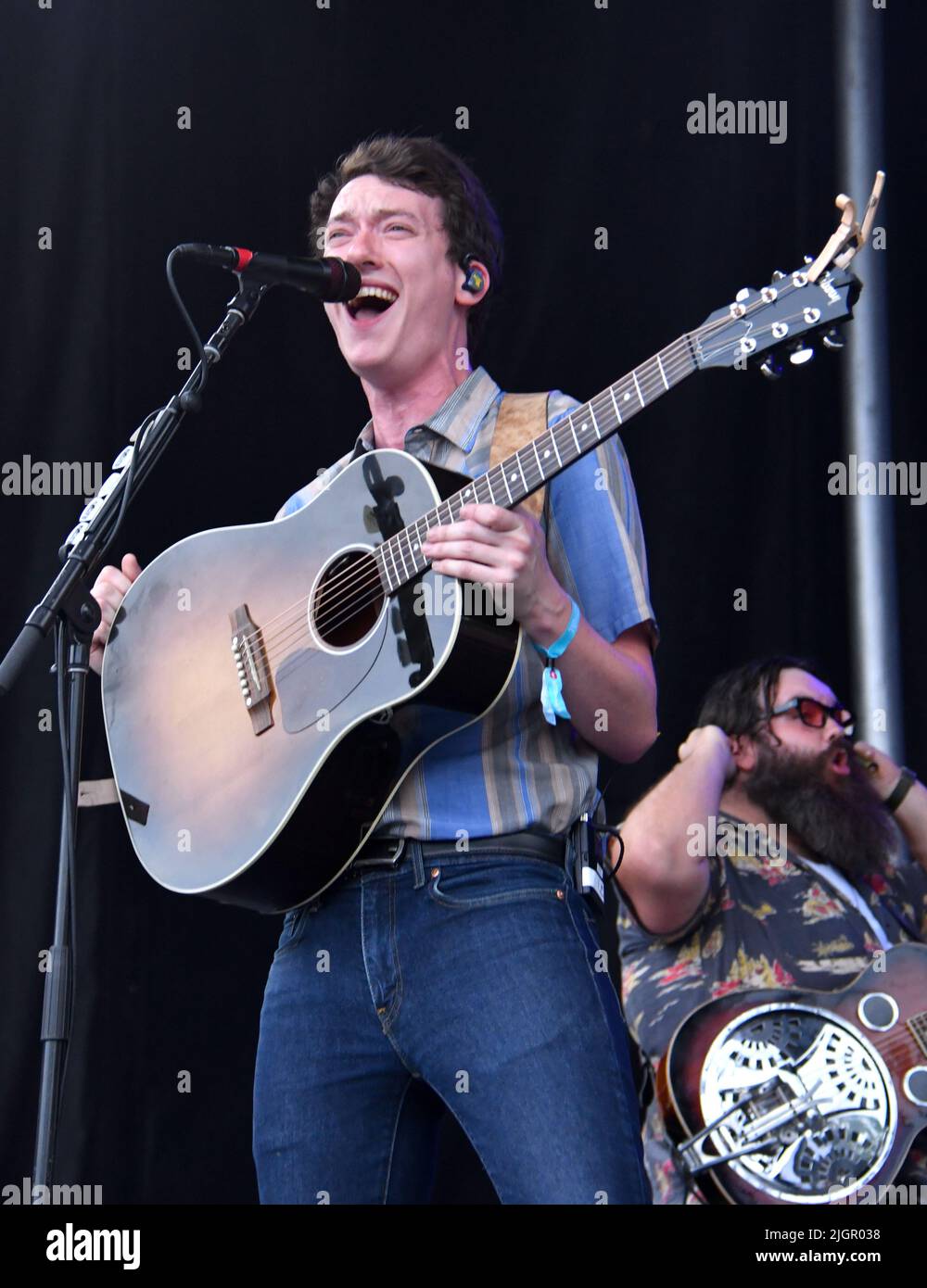 Singer and guitarist Mason Via is shown performing on stage during a ...