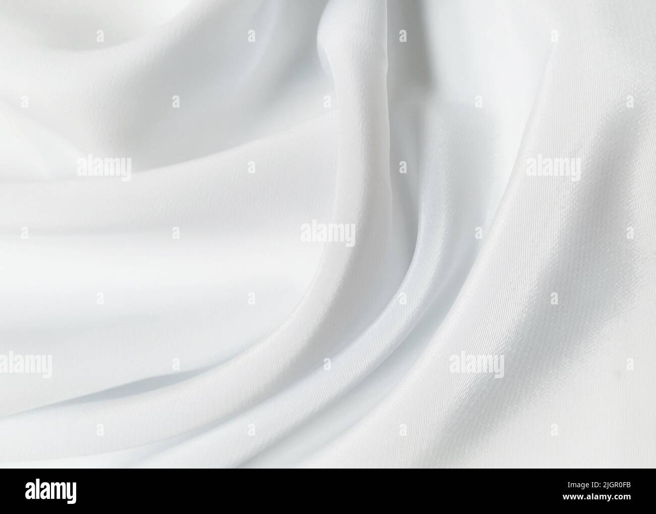 White crumpled or wavy fabric texture background. Abstract linen cloth ...