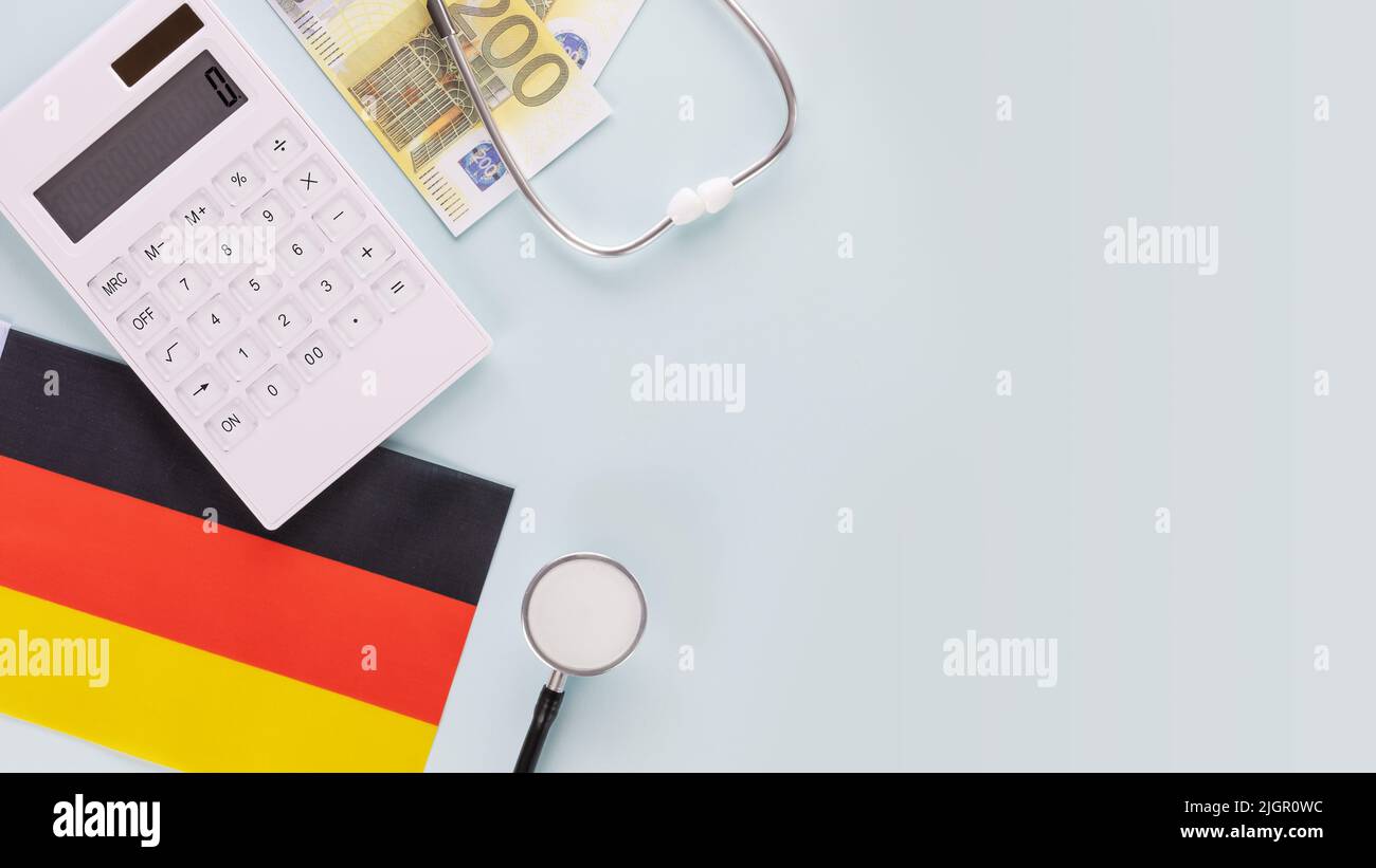 Medical insurance in Germany. Calculator, stethoscope, flag of Germany ...