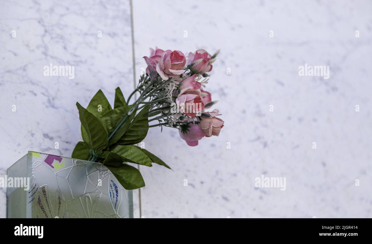 Bright red rose with petals, bouquet and celebration Stock Photo - Alamy