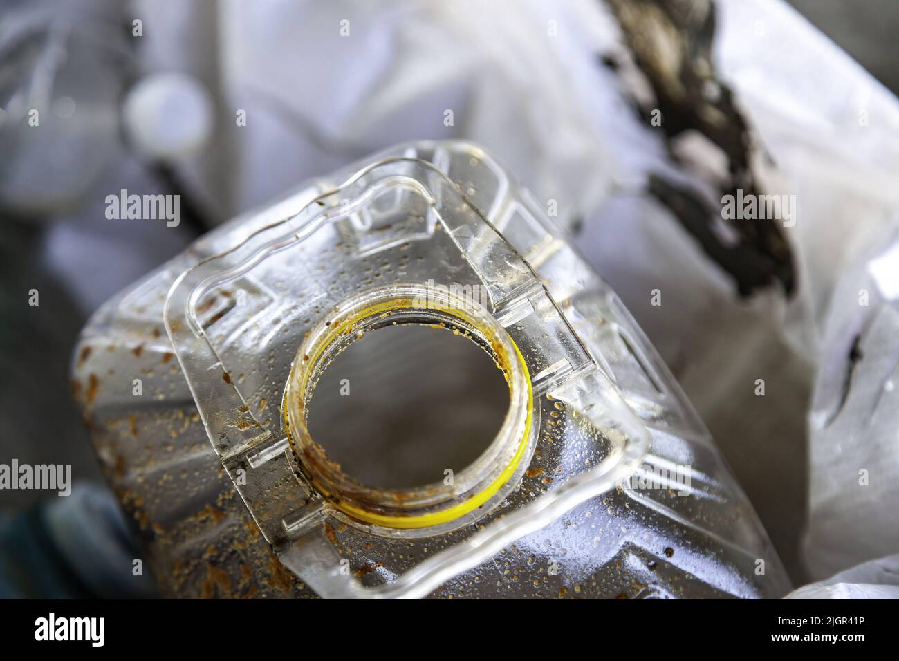 Plastic bottle used oil, recycling and ecology Stock Photo - Alamy