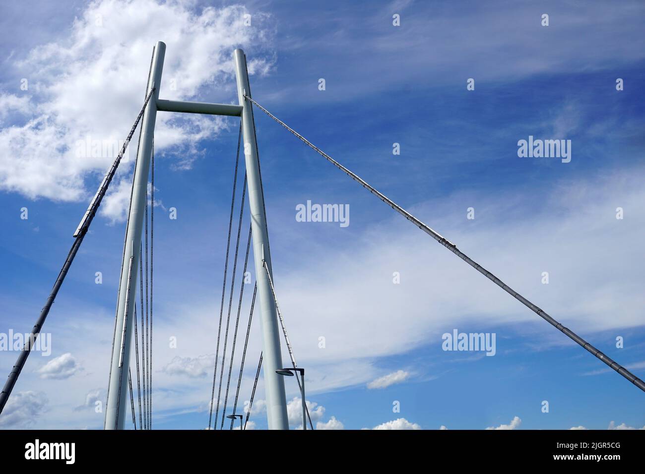 Modern cable-stayed bridge, sky with clouds Stock Photo - Alamy
