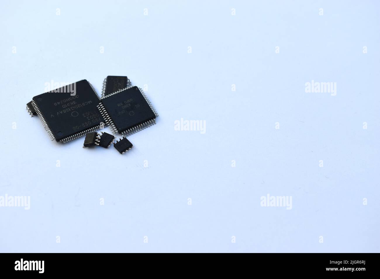 Modern microchips and mikroprocessors on a white background, isolated ...