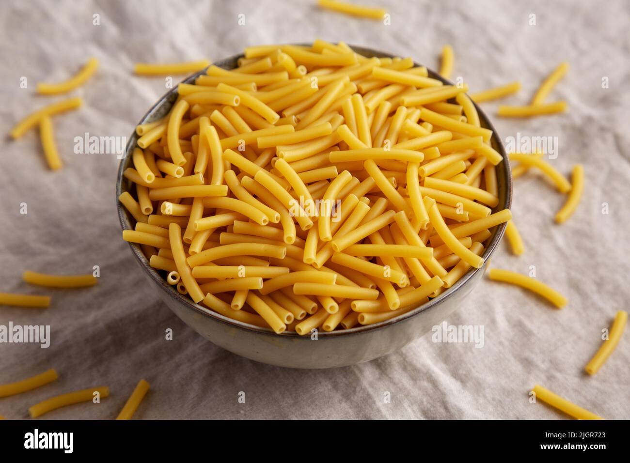 Dry Organic Maccheroni Pasta in a Bowl, side view Stock Photo - Alamy