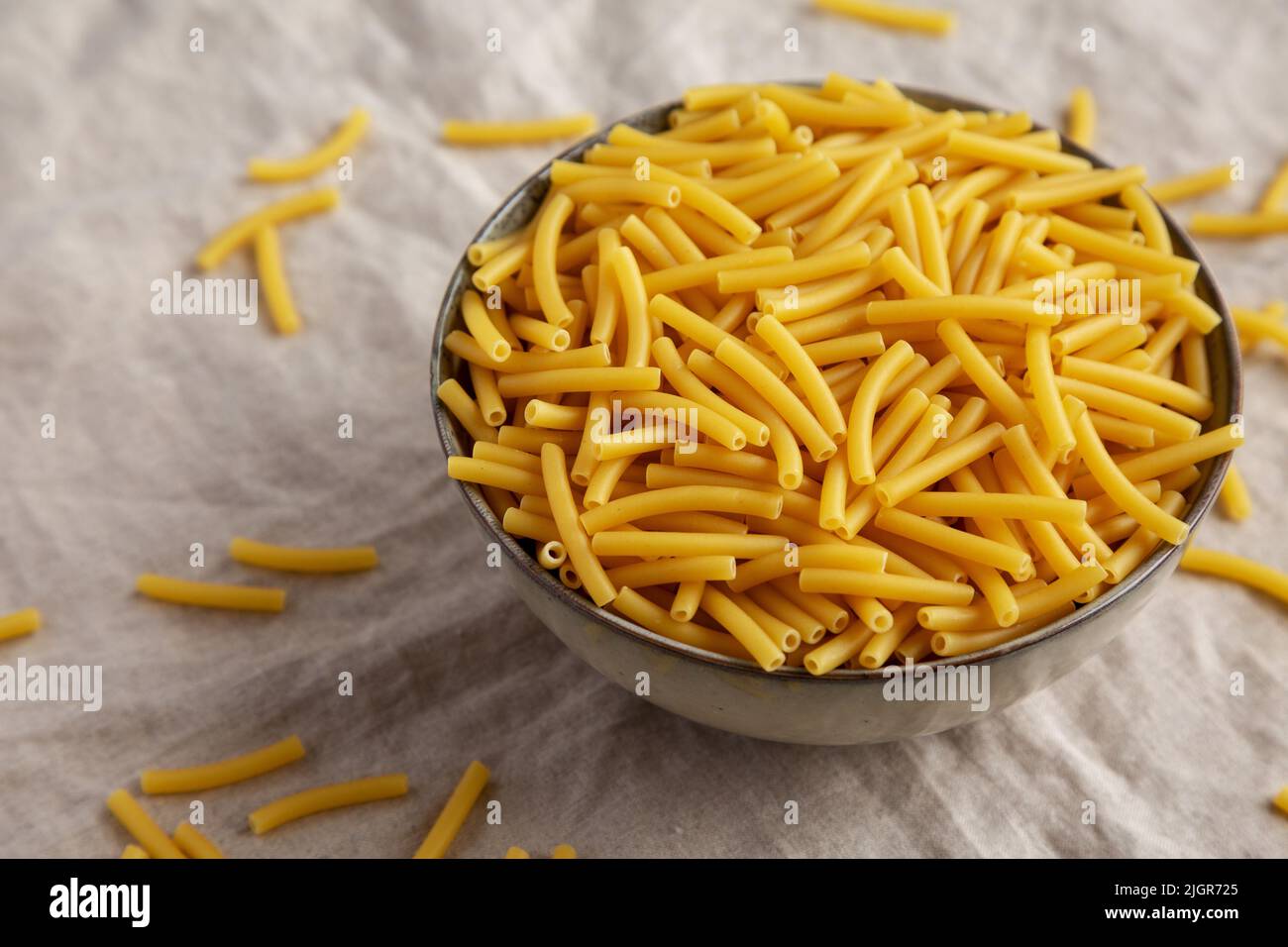 Dry Organic Maccheroni Pasta in a Bowl, side view Stock Photo - Alamy