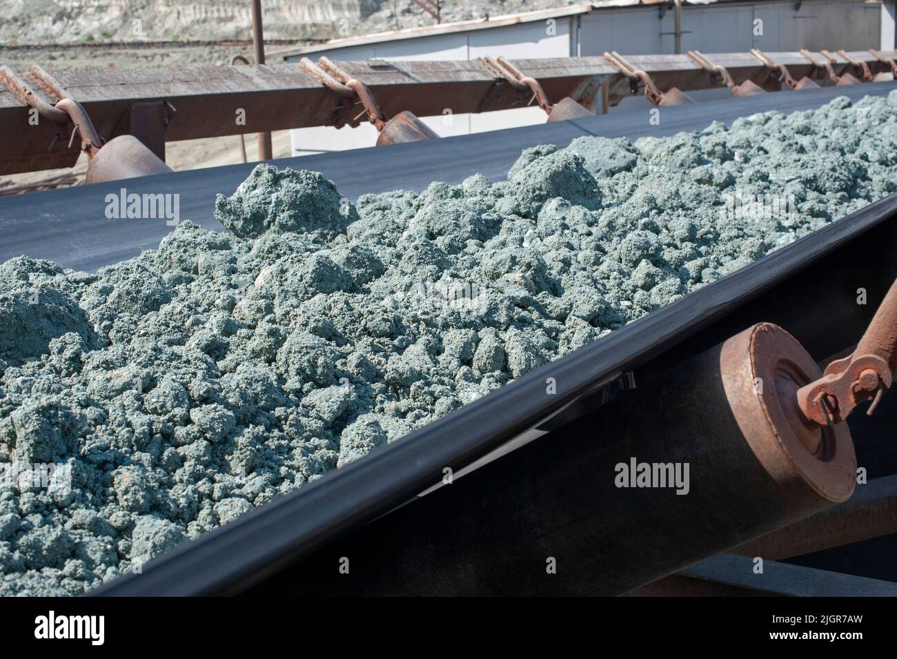 Conveyor belt moves raw materials from the quarry for processing Stock ...