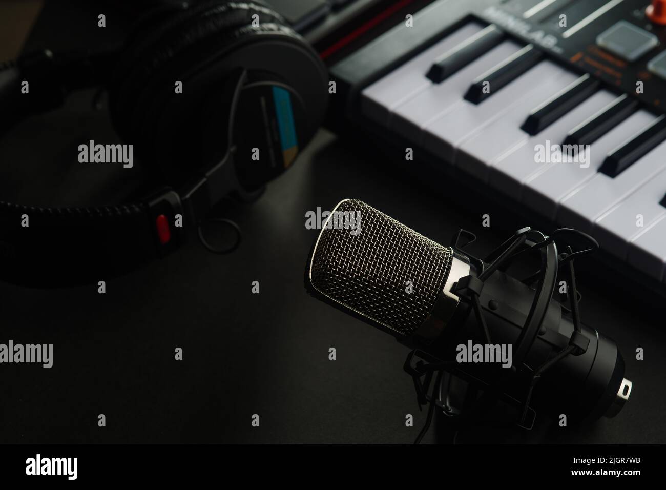 Professional studio equipment - microphone, headphones and midi ...