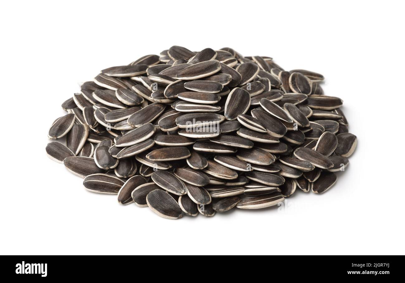 Pile of fresh raw sunflower seeds isolated on white Stock Photo - Alamy