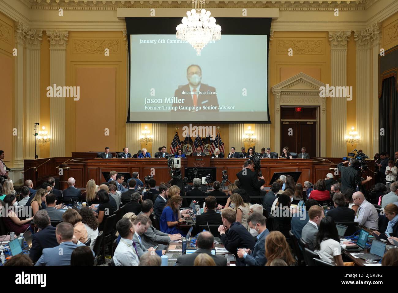 POOL REMOTE - NYTJAN6 - A video of Jason Miller is shown on a screen ...
