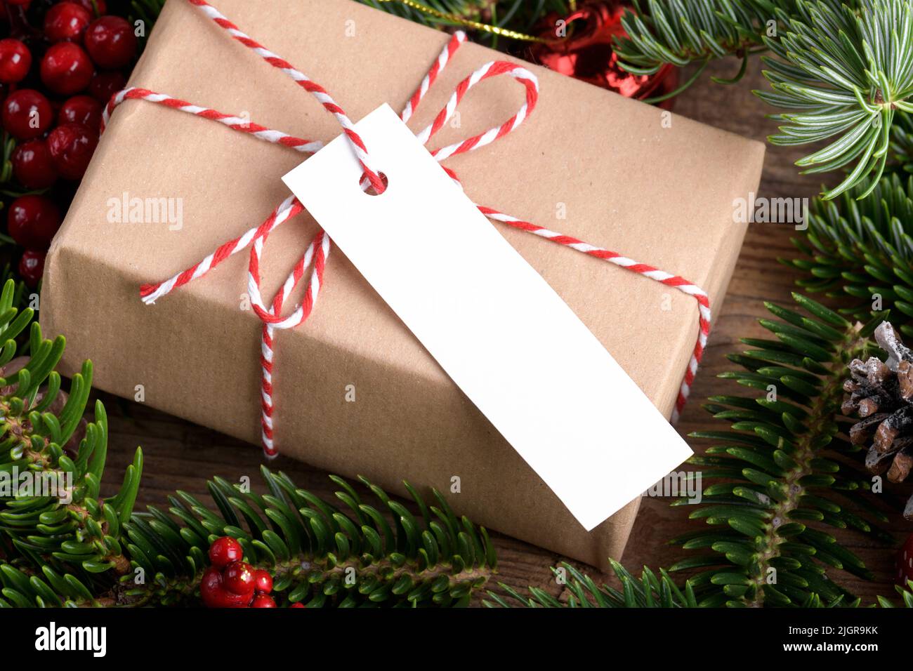 Christmas rectangle strip gift tag mockup with present box, product ...