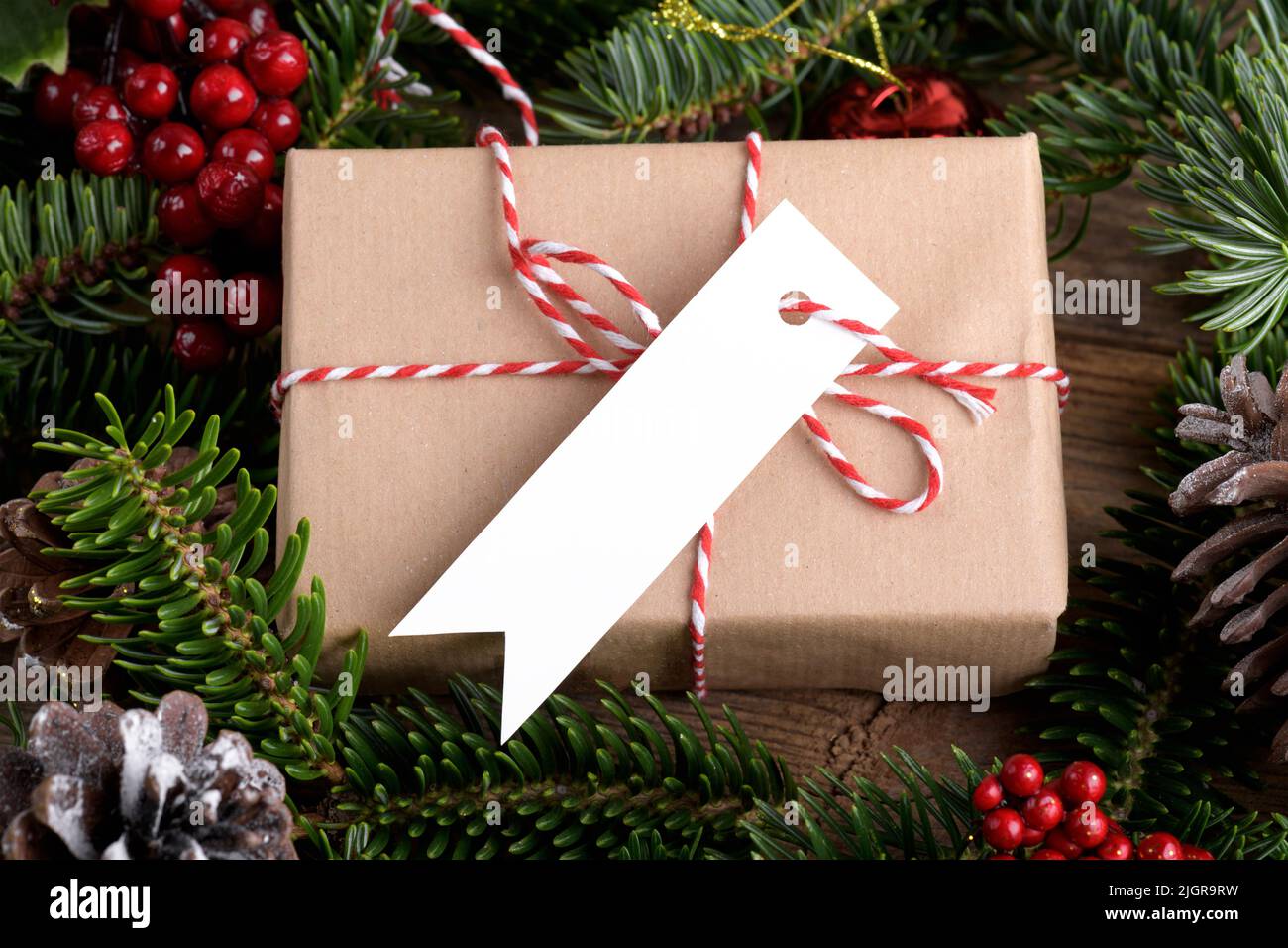 Christmas rectangle strip gift tag mockup with present box, product ...