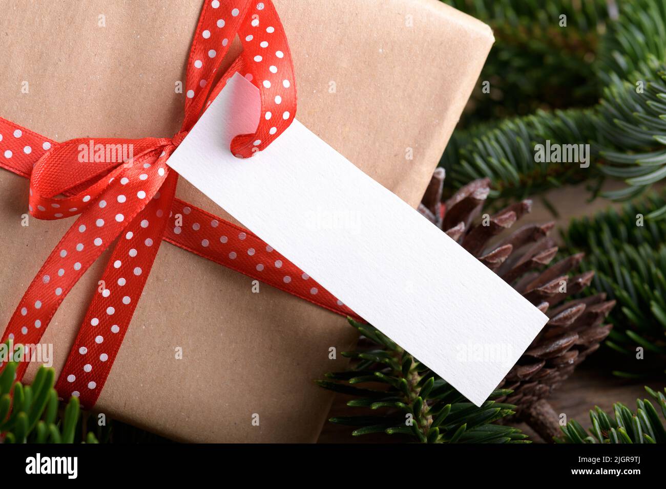 Christmas rectangle strip gift tag mockup with present box, product ...