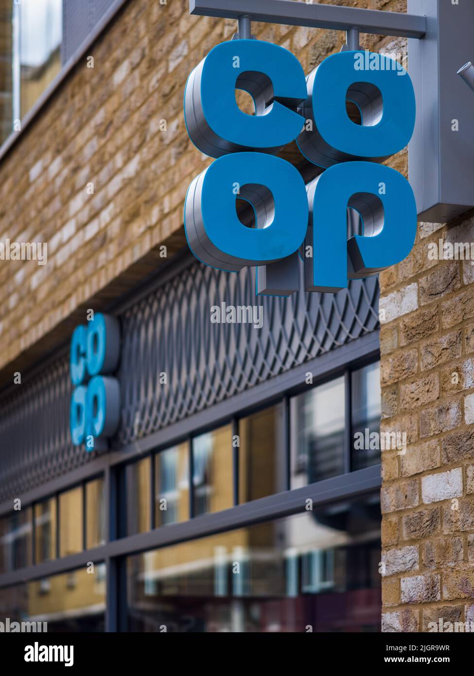 Coop store sign outside a store on Berwick St Soho London. Inner City ...