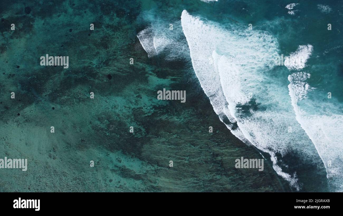 An aerial view of sea waves crashing Stock Photo - Alamy