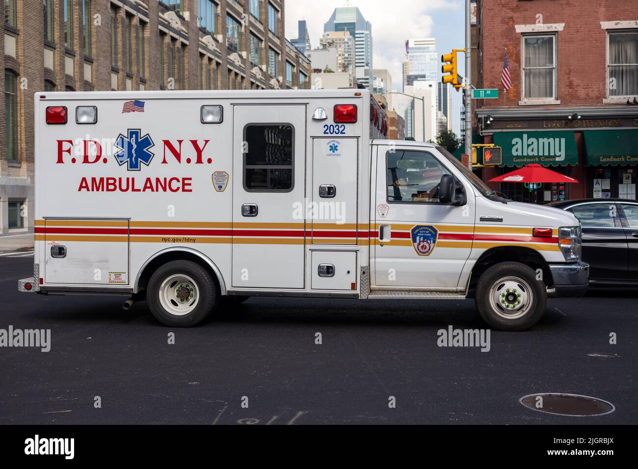 A white ambulance "Fire Department of New York" parked on the street in ...