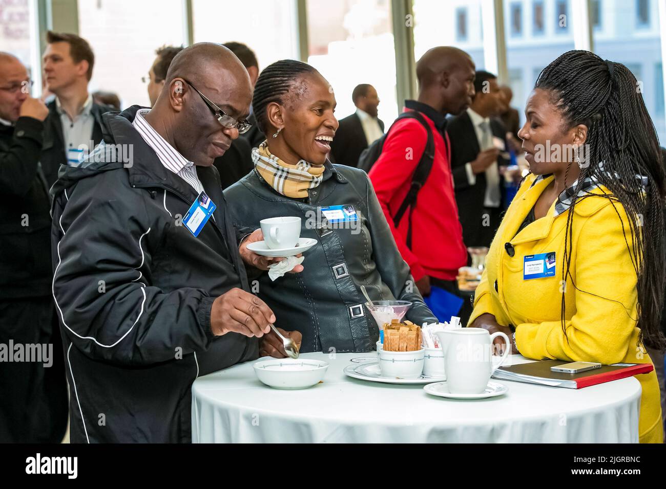 The delegates networking at a corporate conference Stock Photo - Alamy