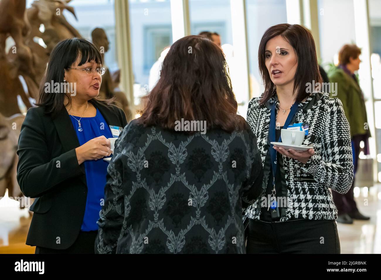The delegates networking at a corporate conference Stock Photo - Alamy