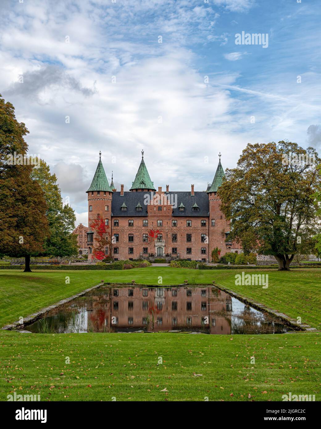 The Trolleholm castle in the Eslov region of Southern Sweden reflected in the water Stock Photo ...