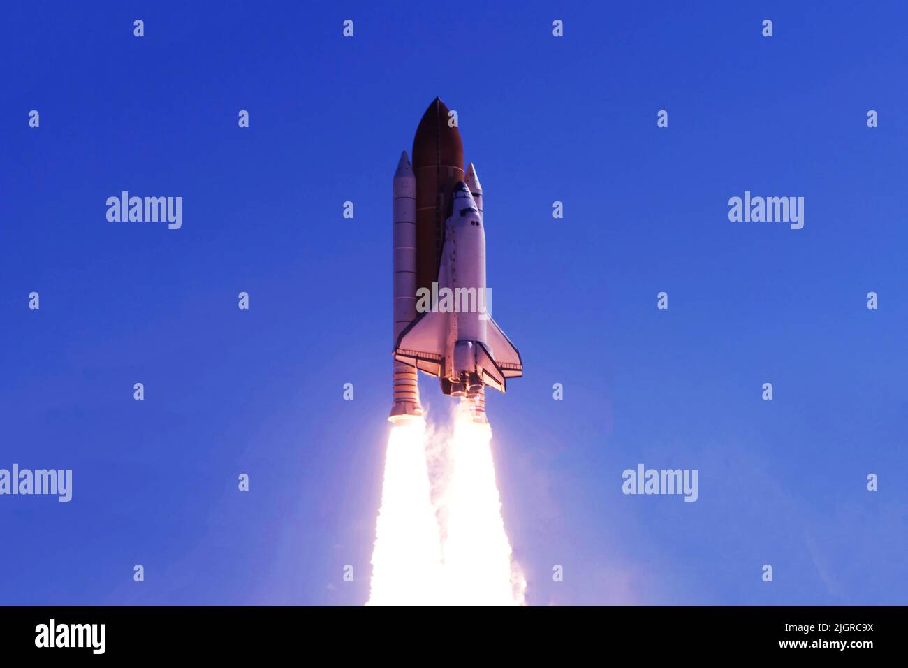Rocket launch into space. Elements of this image furnished by NASA ...